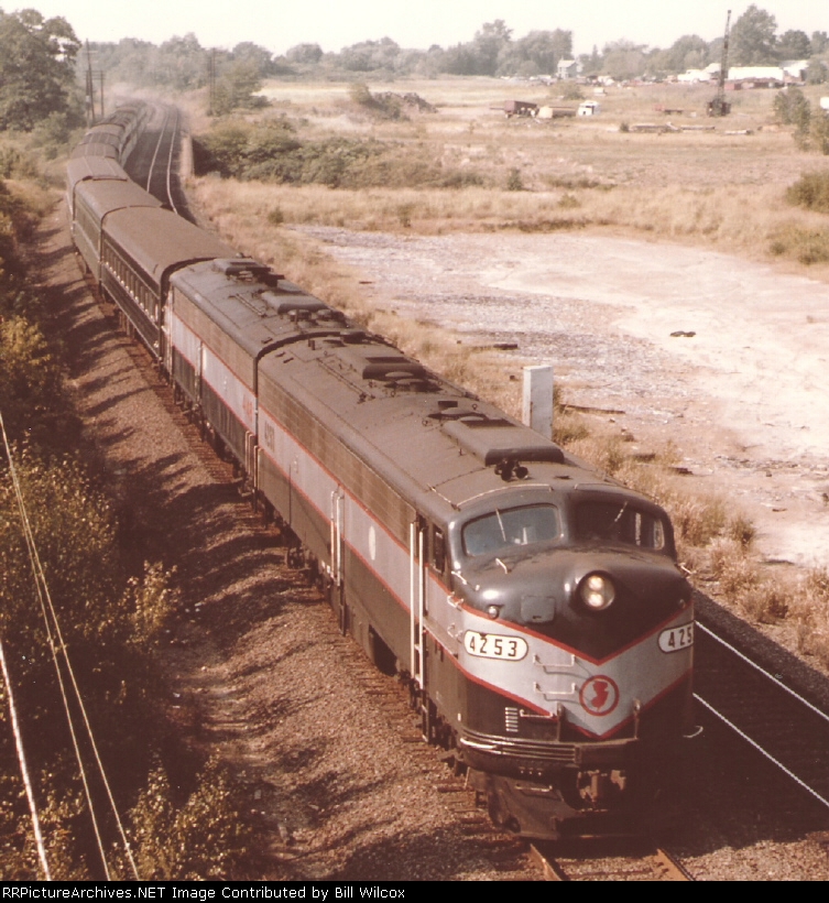 NJDOT E8A's 4253 & 4248 cross the Garden State Parkway with New York & Long Branch train #3361